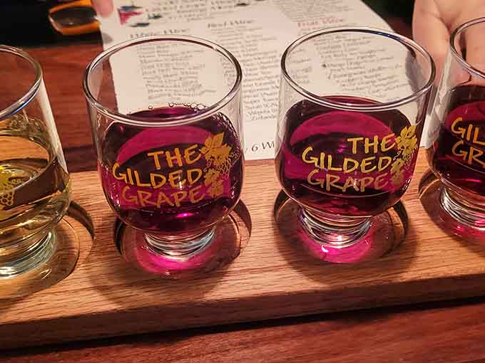 A proper wine flight presentation that makes choosing just one favorite feel impossible, which is exactly the point of the exercise.