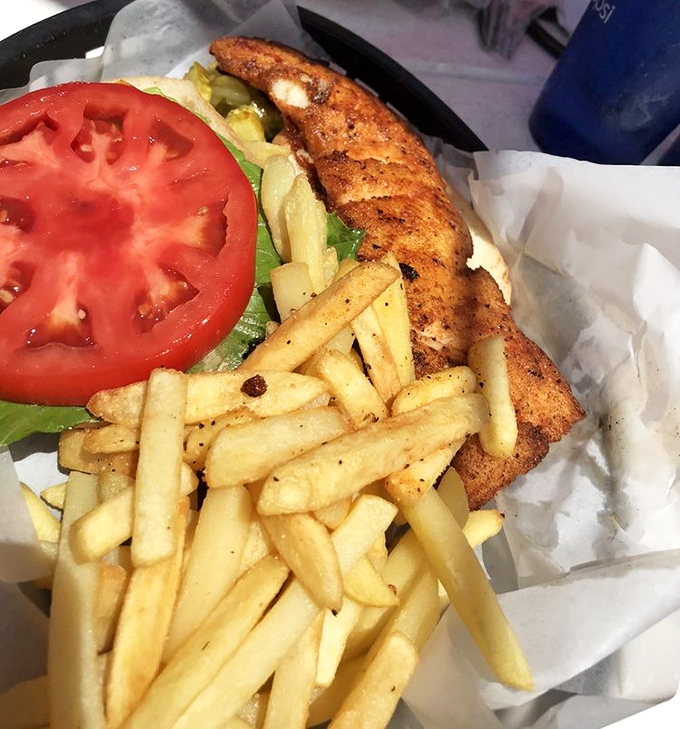 Blackened grouper sandwich: where fish extends beyond the bun in a glorious declaration that portion control is overrated.