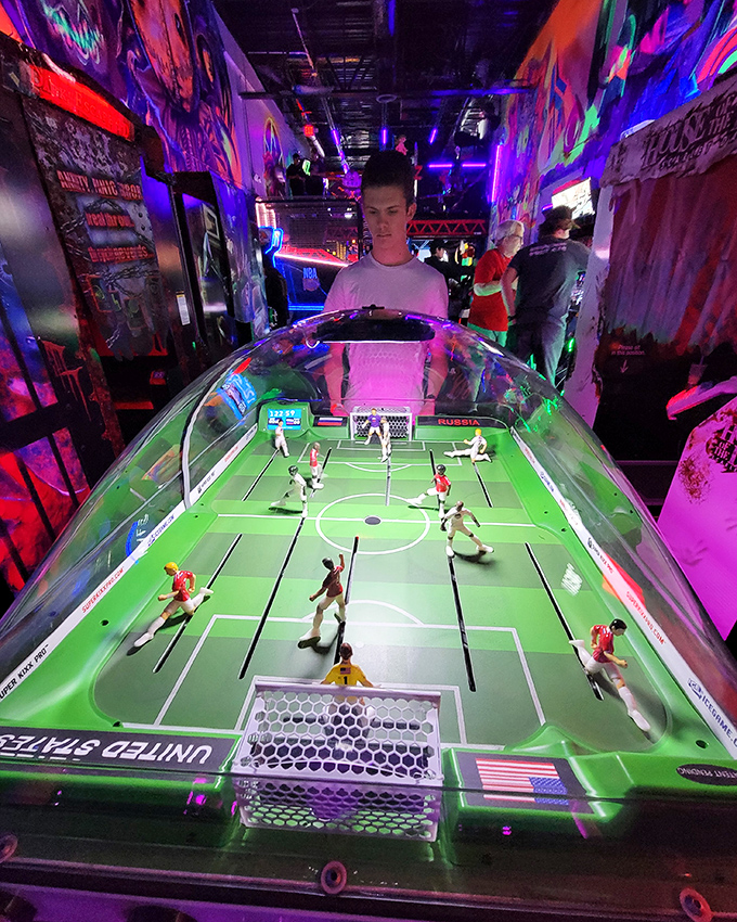 ICE Super Kixx Pro: Miniature soccer players locked in eternal competition while humans control their fate. It's like playing God, but with better lighting.