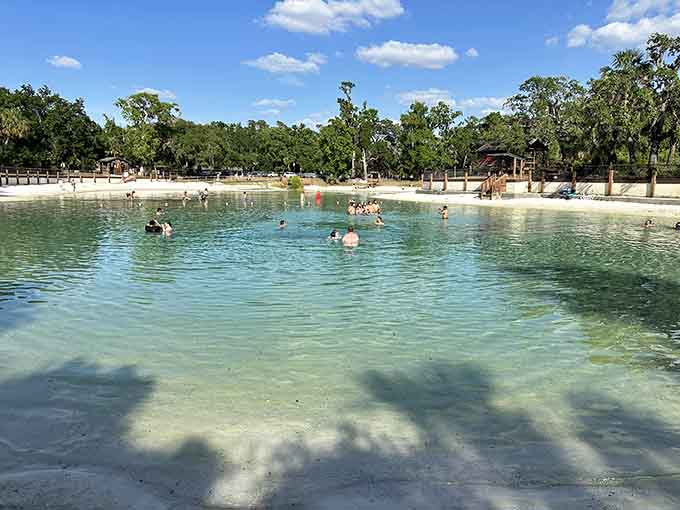 The spring pool gleams like an enormous natural swimming pool that Mother Nature built and forgot to charge admission for, which is very generous of her.