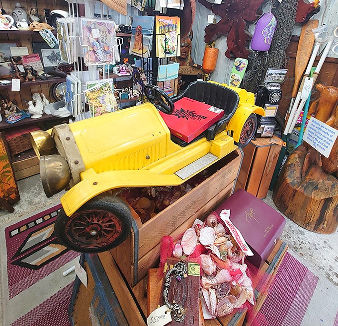 This vintage yellow pedal car waits patiently for a child with imagination or an adult with nostalgia and too much disposable income.