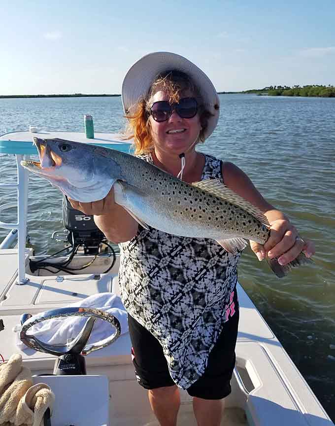 The smile on this angler's face tells you everything you need to know about why they call this the Redfish Capital of the World.