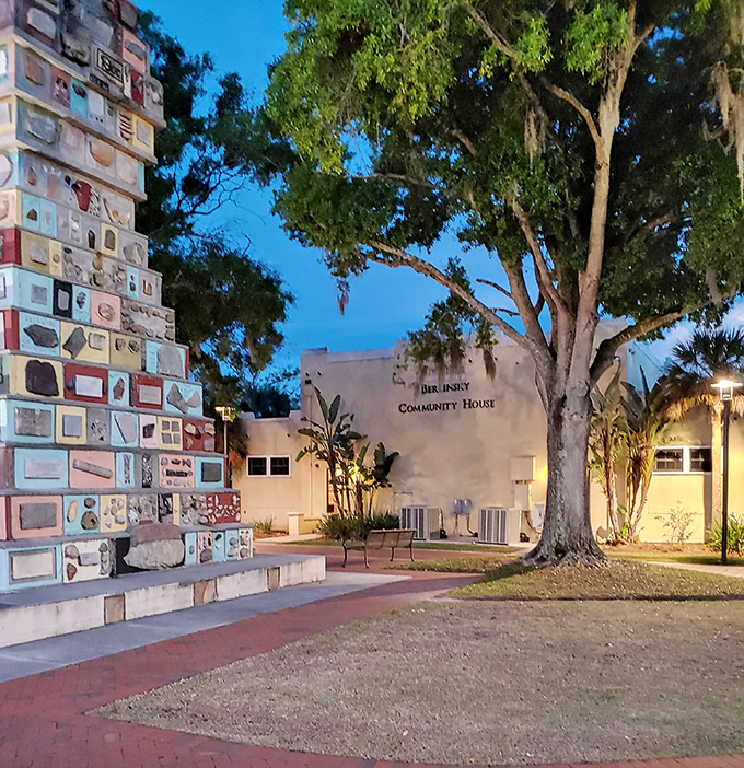 Even at dusk, the Monument of States maintains its charm, illuminated against the Berlinsky Community House backdrop.