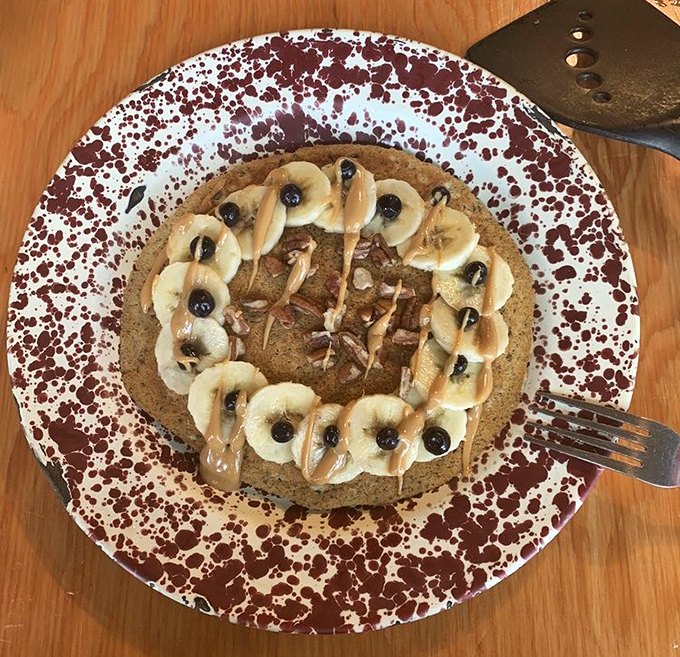 Peanut butter banana pancakes arranged in artistic perfection, where creamy meets fluffy in breakfast harmony.