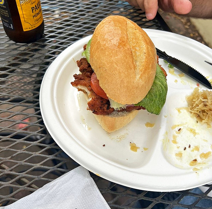 This beauty comes with a side of authentic German potato salad, because apparently someone here understands that great schnitzel deserves equally great accompaniments.