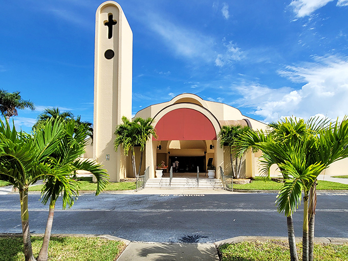 St. Sebastian Catholic Church stands serene against Florida's blue sky, its architecture a peaceful sanctuary from coastal bustle.