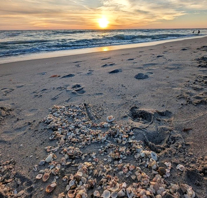Golden hour magic paints the Gulf horizon – Blind Pass Beach sunsets transform ordinary moments into memories that last a lifetime.