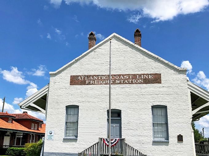 The historic Atlantic Coast Line Freight Station now houses the Suwannee County Historical Museum, a white-brick time capsule of local heritage.
