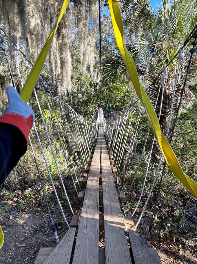 The swaying bridge that separates the cautious from the courageous, offering views that make every wobbly step absolutely worthwhile.