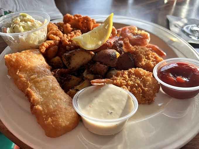 The seafood platter is basically the Gulf's greatest hits album, featuring shrimp, fish, and sides that understand the assignment perfectly.