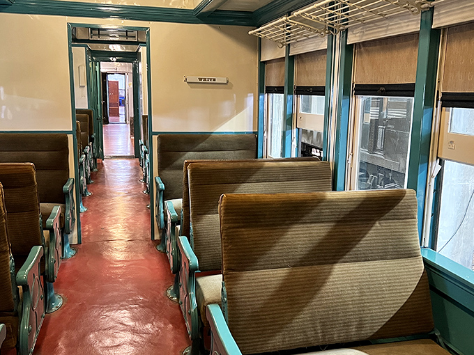 Polished wood paneling and plush seating speak of an era when train travel meant elegance and adventure, not just getting from A to B.