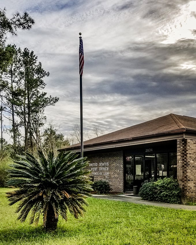 United States Post Office: This humble brick building connects the tiny town to the wider world, standing proudly with its American flag.