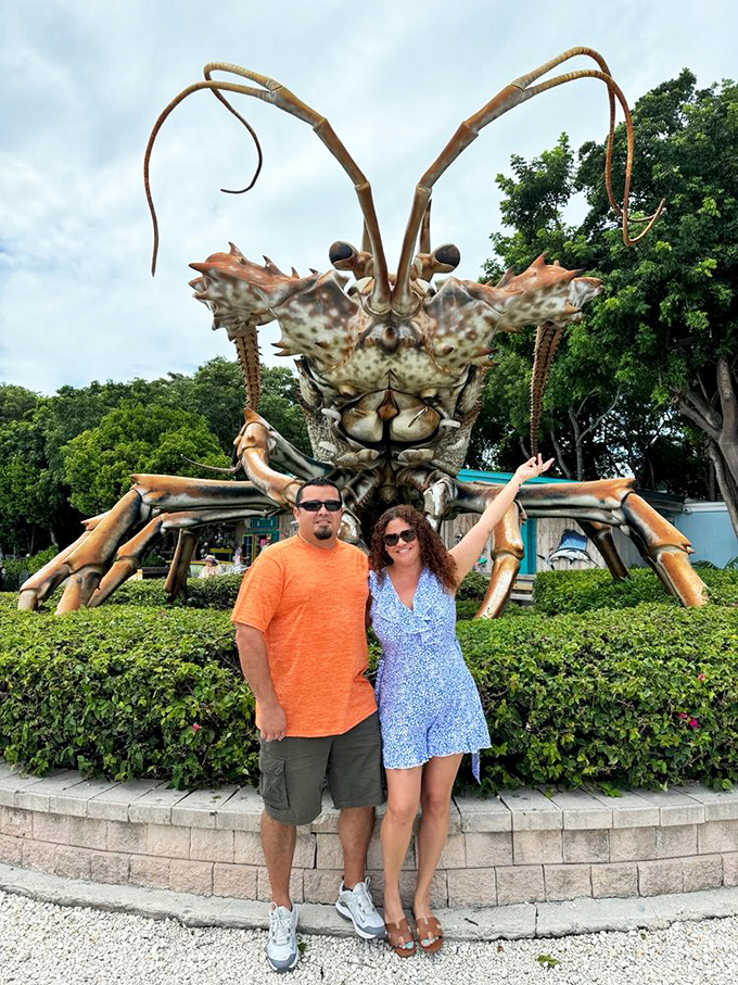 The universal language of vacation photos: "Look honey, we found a giant lobster in the wild!" A must-stop selfie spot.