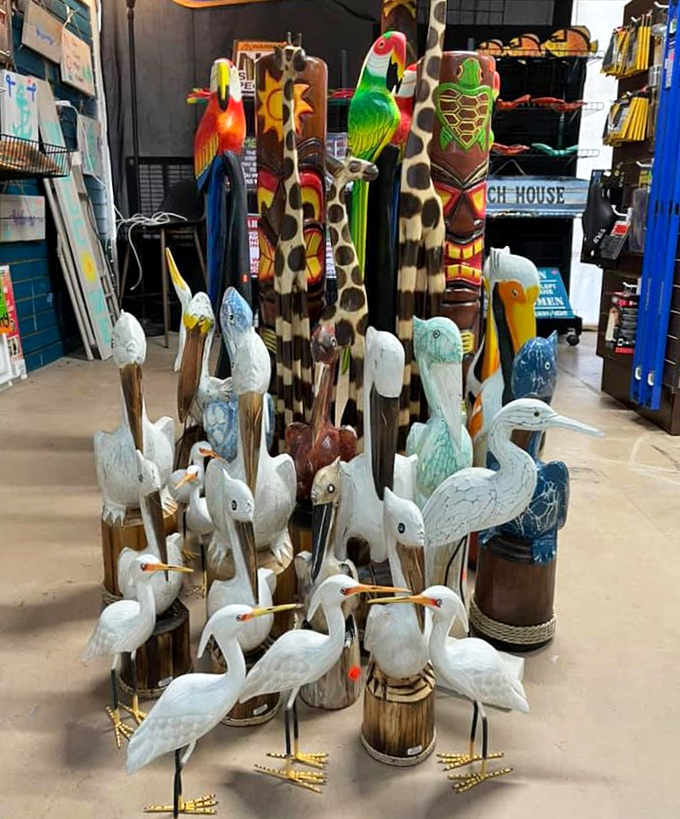 A flock of wooden birds and tropical creatures stands at attention, ready to migrate to new homes and add Florida charm to any d&eacute;cor.
