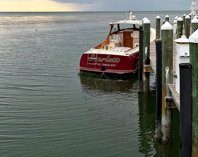 "Scarlette" waits patiently at the dock &ndash; this classic wooden vessel isn't just transportation, it's a time machine to elegance.