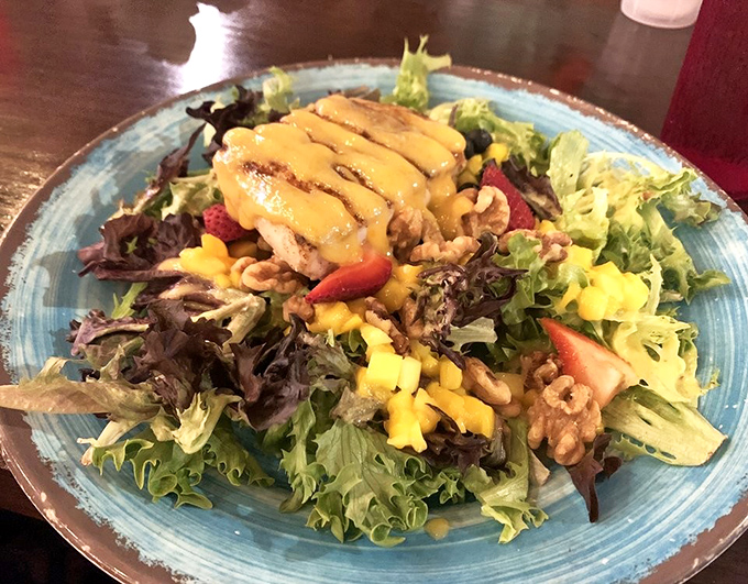 Another angle of culinary perfection &ndash; the contrast between warm, spiced fish and cool, sweet fruit creates a taste sensation worth traveling for.