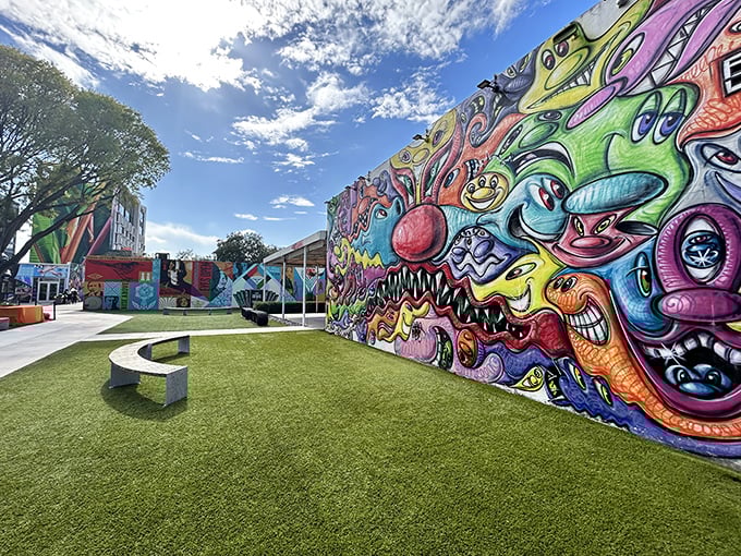 Even the ground at Wynwood Walls gets the artistic treatment, with manicured green spaces providing perfect viewing spots for the surrounding murals.