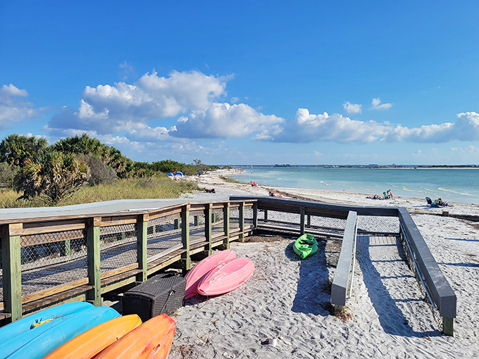 Colorful kayaks wait patiently for adventure-seekers &ndash; like eager puppies hoping you'll pick them for the next water expedition.