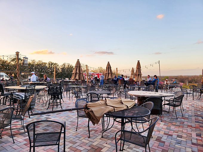 As afternoon turns to evening, the outdoor seating area becomes the perfect spot to unwind with friends and a bottle of something special.