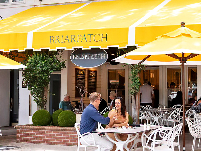 Briarpatch Restaurant's sunny yellow awnings signal a perfect spot for people-watching while savoring brunch classics with a Florida twist.