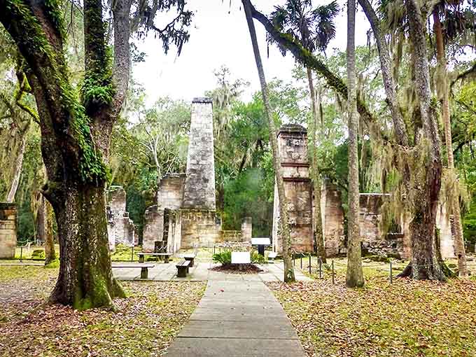 Moss-covered stone walls are all that remain of the once-bustling Dummett Sugar Mill, destroyed during the Seminole Wars.