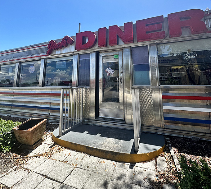 Jack's Hollywood Diner gleams in classic stainless steel, a true vintage diner car that looks straight out of an American movie.