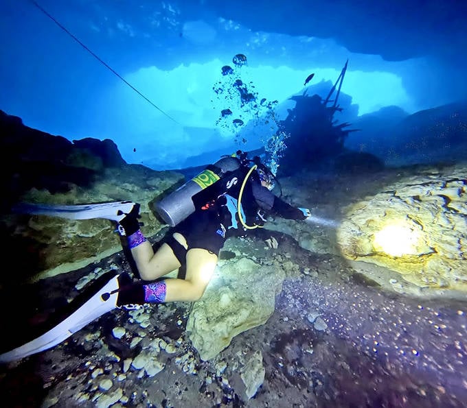 Swimmers can explore Blue Grotto's shallower regions while divers venture deeper into the limestone cavern's mysterious blue depths.