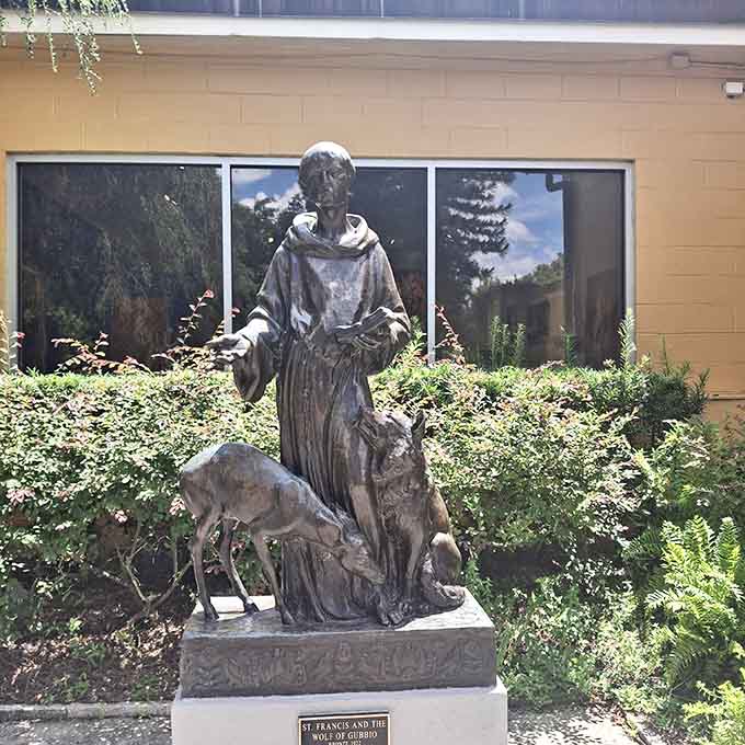 St. Francis communes with his unlikely wolf companion, a touching scene that Disney wishes it had thought of first.