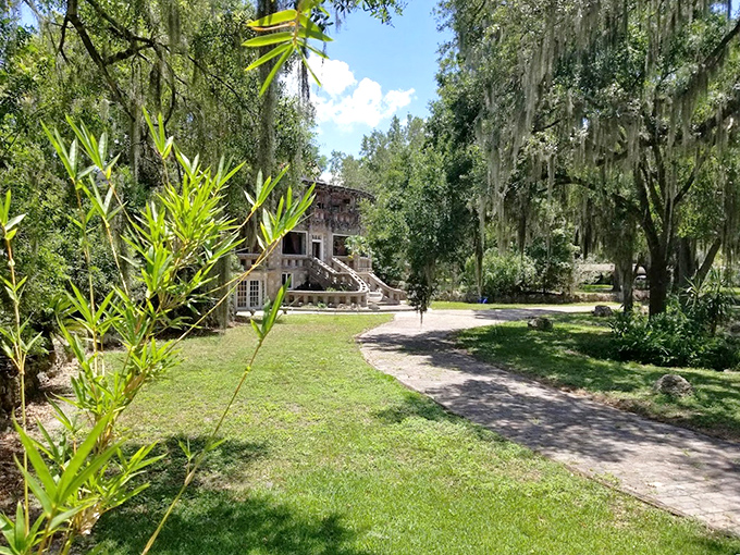 The approach path leads visitors toward adventure, each step building anticipation for the architectural oddities that await beyond.