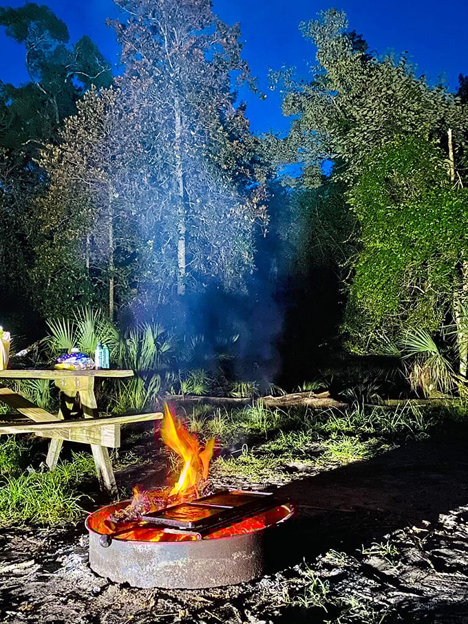 Evening campfires under Spanish moss&mdash;where ghost stories feel a little too real and s'mores taste even better.