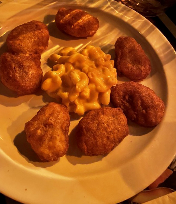 Golden chicken nuggets surrounding a treasure chest of mac and cheese &ndash; kid-friendly fare that even the pickiest little pirates will plunder.