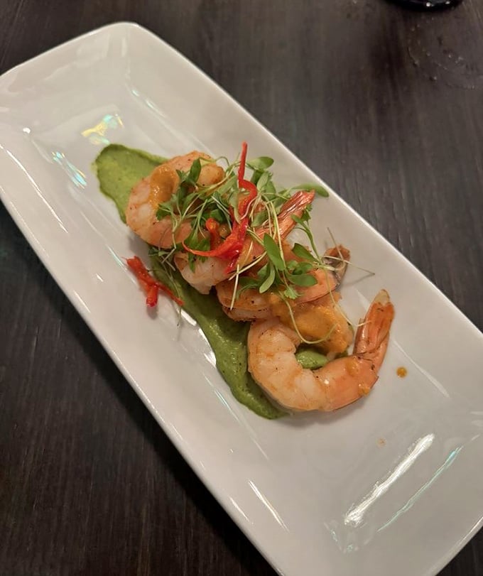 These jumbo shrimp, perched atop a verdant green purée, look like they've been arranged by Cinderella's helpful bird friends.