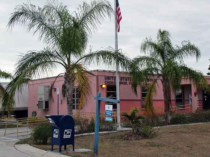Even the post office here is pink and perched on stilts, because Chokoloskee does everything with a bit more character than necessary.