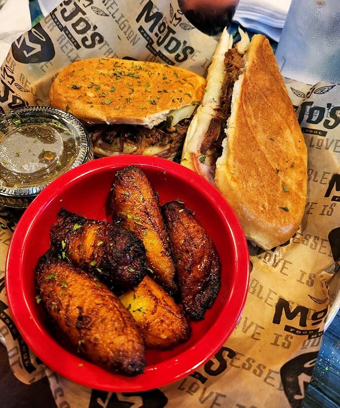 Sweet meets savory in this perfect pairing. The caramelized plantains provide a tropical counterpoint to the hearty sandwich.