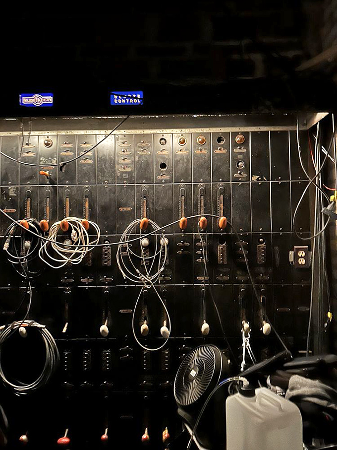 Behind the scenes, this vintage dimmer board looks like something from a mad scientist's lab &ndash; theatrical magic at your fingertips.