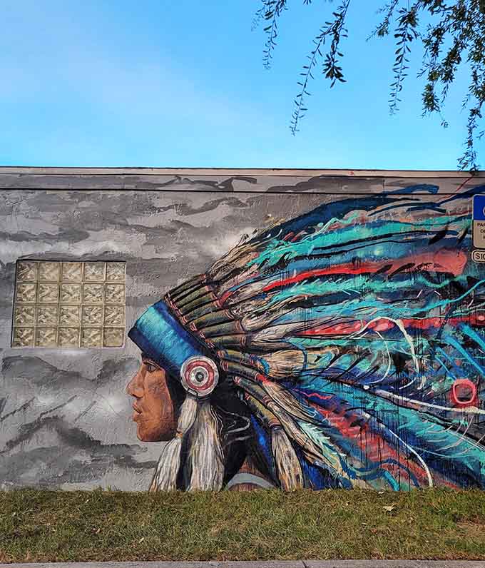 A Native American chief rendered in brilliant colors watches over the district, his headdress flowing with more detail than seems physically possible.