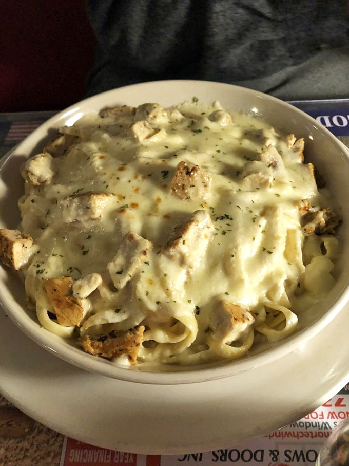Fettuccine Alfredo with grilled chicken&mdash;where creamy meets dreamy in a bowl that somehow makes you feel both comforted and sophisticated.