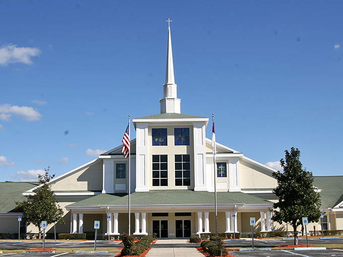 First Baptist Church Inverness: Its gleaming white steeple reaches skyward, a serene landmark against Florida's famously blue skies.