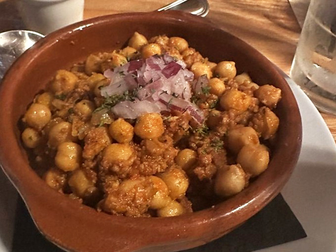 Garbanzos fritos transform humble chickpeas into a spicy, savory addiction &ndash; proof that Spanish cuisine can make any ingredient sing.