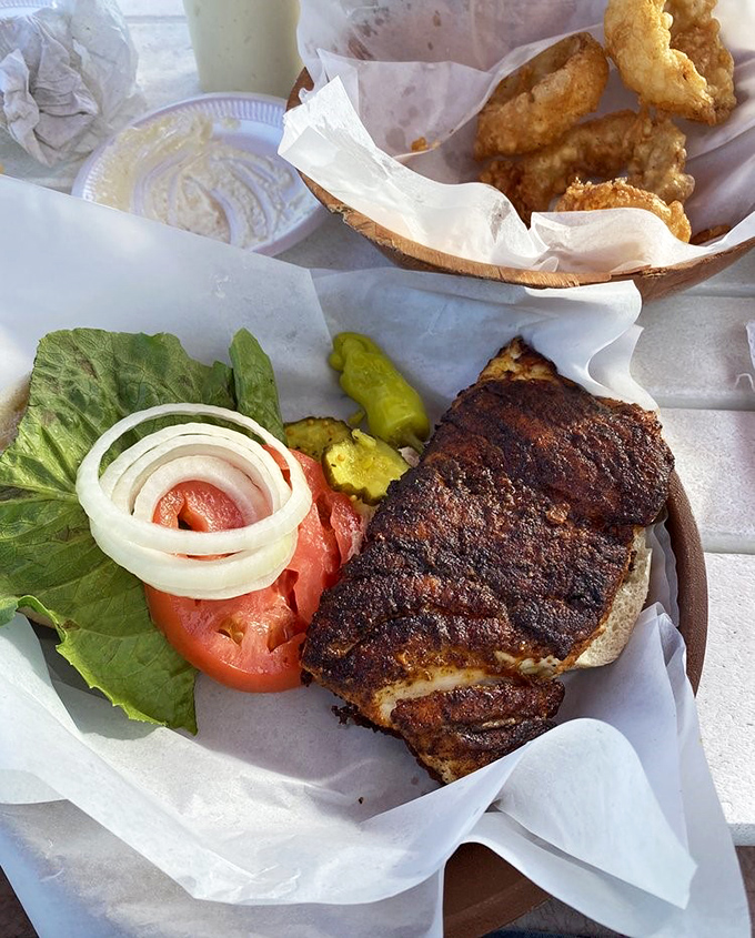 The perfect marriage of crispy fries and blackened grouper &ndash; a coastal romance that makes French fries feel like they've finally met their soulmate.