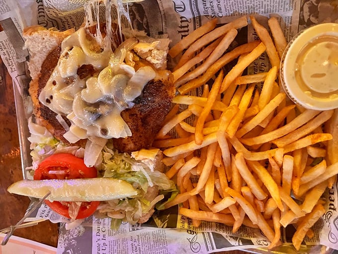 The sandwich that launched a thousand return visits &ndash; melted cheese cascading over perfectly grilled hogfish like a savory waterfall.