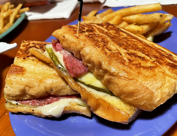 The Cuban sandwich gets the Frenchy's treatment &ndash; pressed to perfection with melty cheese embracing savory meats in a harmonious handheld feast.