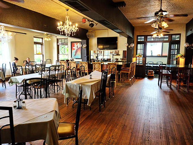 Sinatra's Ristorante offers Italian comfort food in a setting where the chandeliers flicker occasionally for no apparent reason. The tables await both living diners and perhaps some eternal guests.