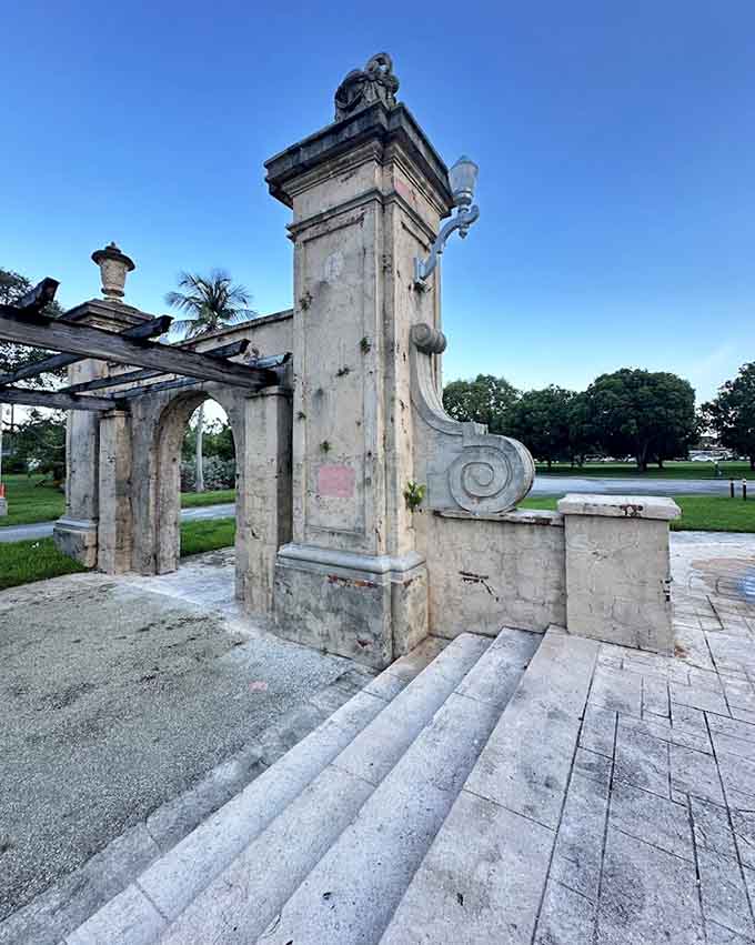 Classical stonework stands proud despite decades of Florida humidity trying its best to disagree with preservation.