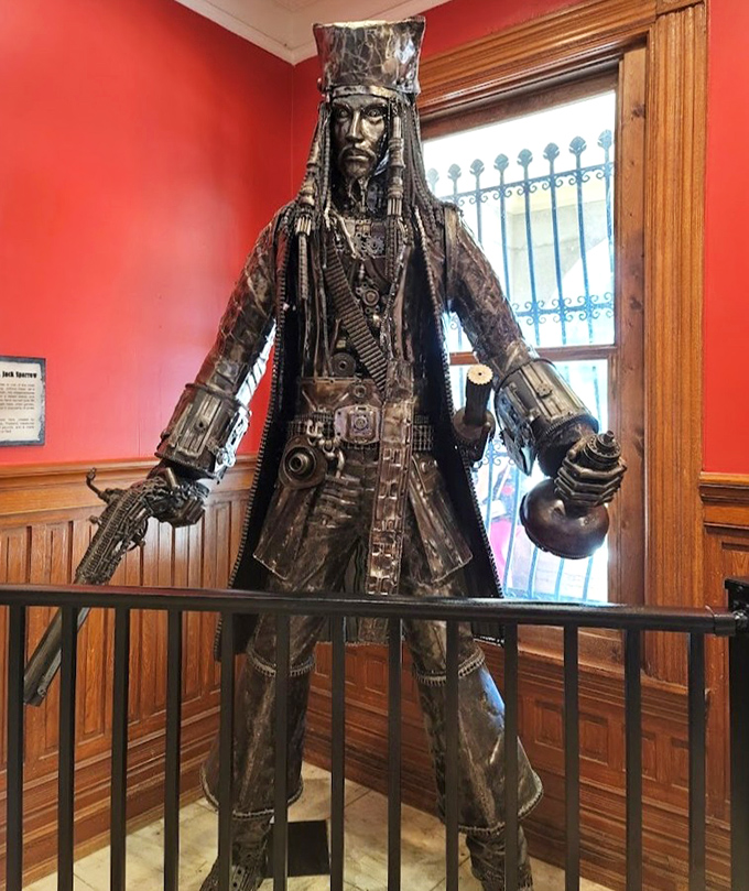 This imposing metal pirate stands guard, assembled from salvaged mechanical parts and weapons &ndash; recycling at its most intimidating!