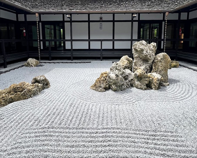 Raked gravel patterns so precise they make crop circles look like amateur hour.