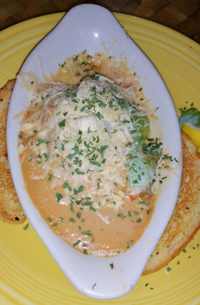 Seafood symphony: Delicate shrimp and scallops nestle between pasta layers, creating a harmonious blend of flavors that dance across your palate.