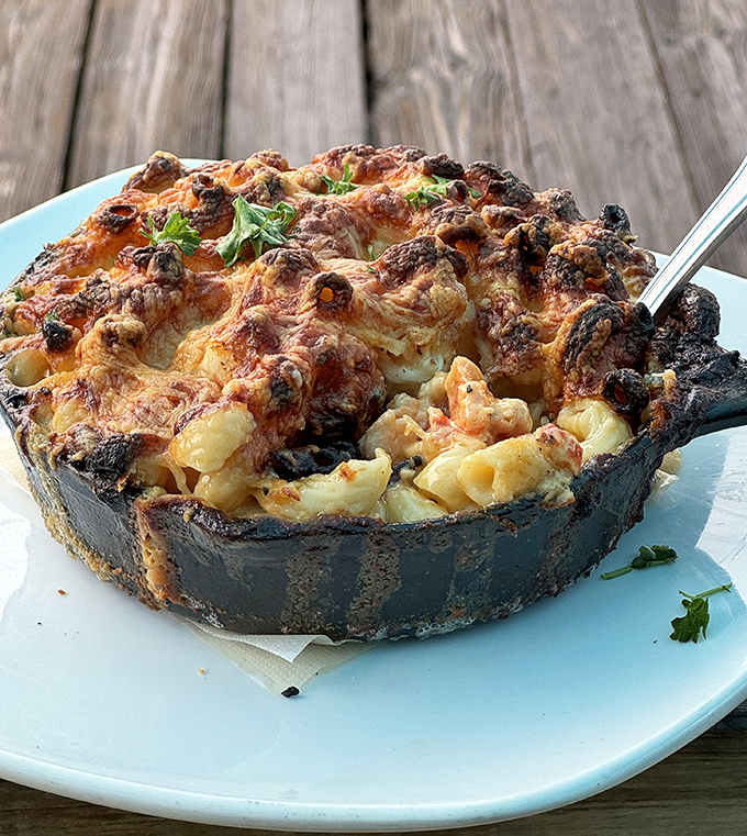 Bubbling cheese forms a golden crust atop this skillet sensation &ndash; breaking through is half the fun, revealing treasures below.