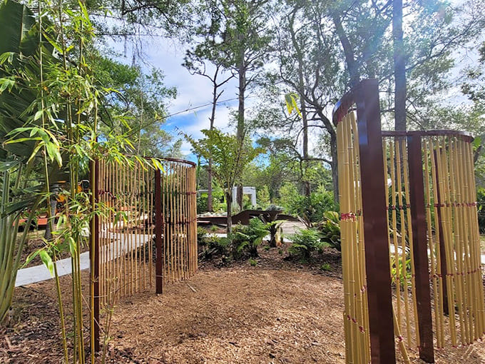 Bamboo installations create natural gateways and sensory experiences, their gentle rustling adding to the garden's symphony of sounds that engage young explorers.