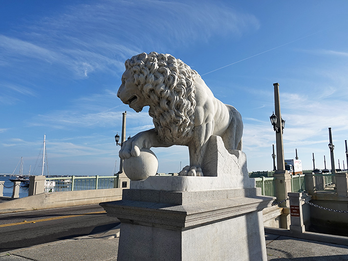 These aren't your garden-variety lawn ornaments – the marble lions have guarded this passage with stony determination since the 1920s.